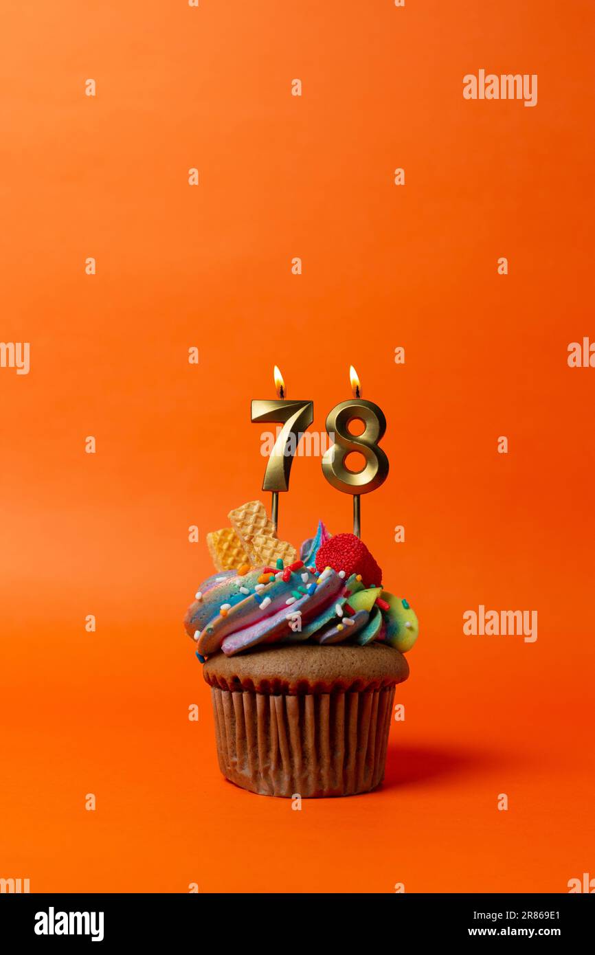 birthday cake with number 78 - cupcake on orange background with ...