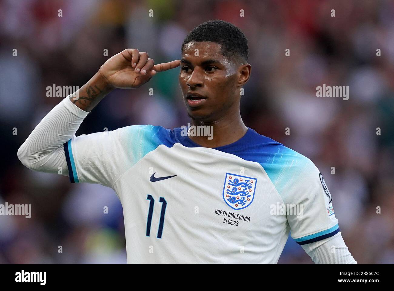 England's Marcus Rashford celebrates scoring their side's third goal of ...