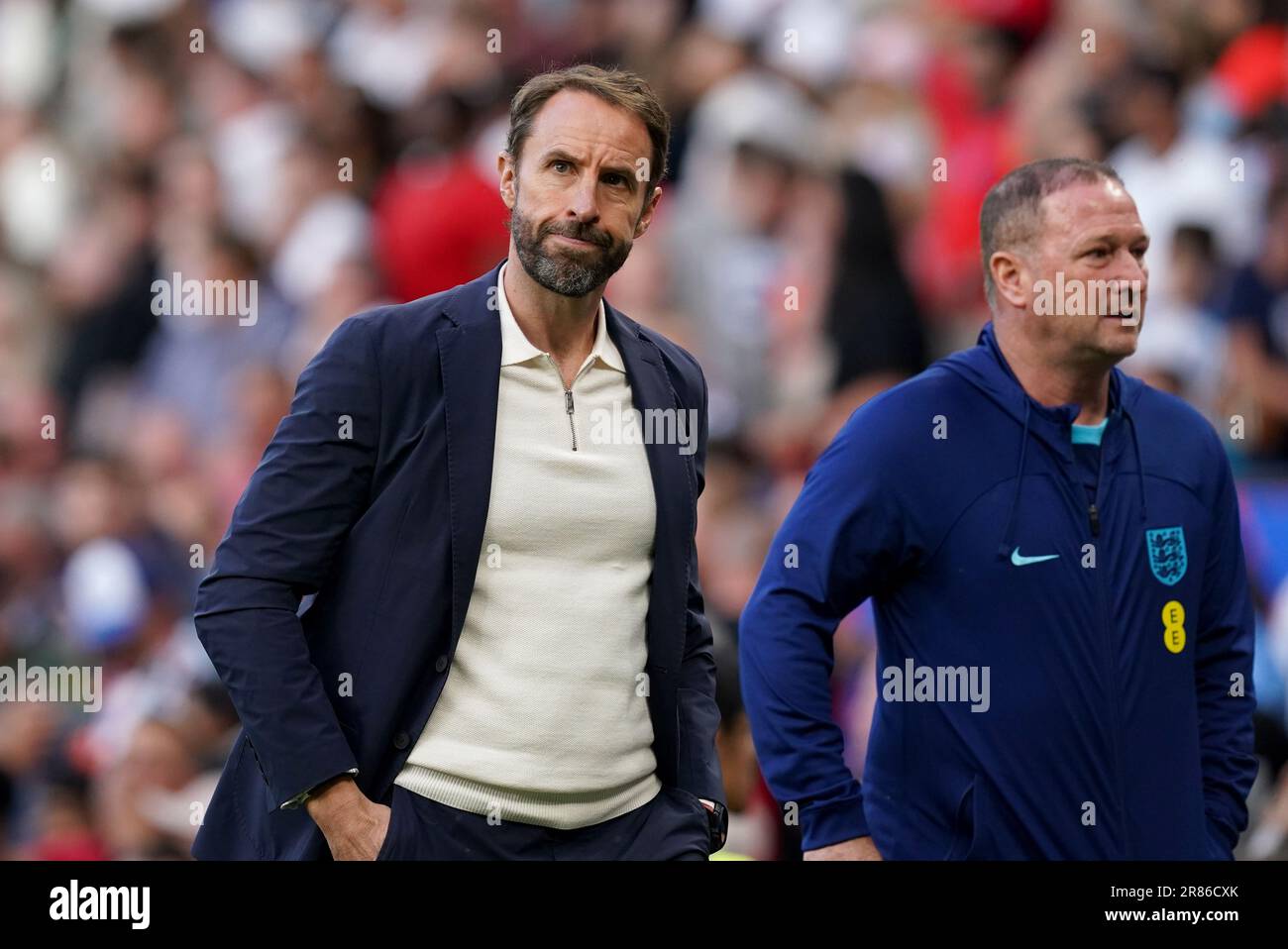 England manager Gareth Southgate (left) and assistant Steve Holland ...