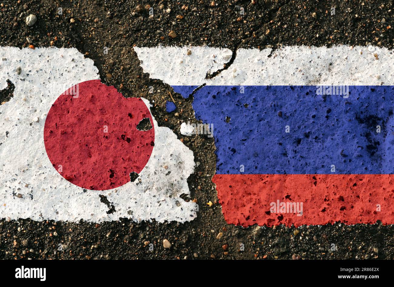 On the pavement are images of the flags of Japan and Russia, as a ...