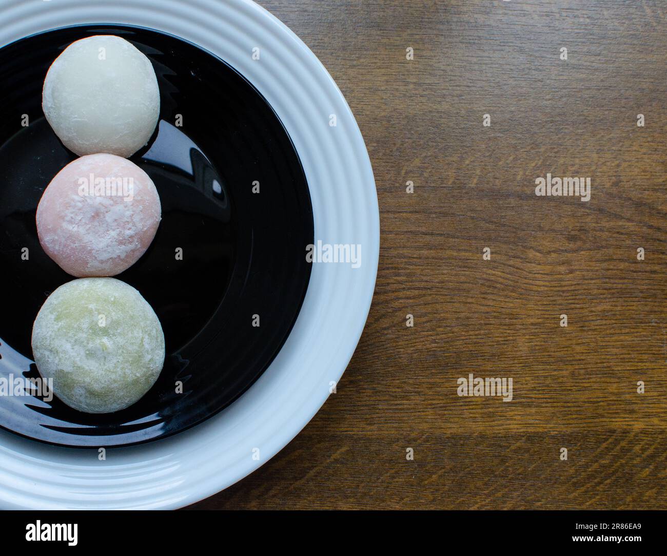 Traditional japanese dessert wagashi mochi rise cake green pink white ...