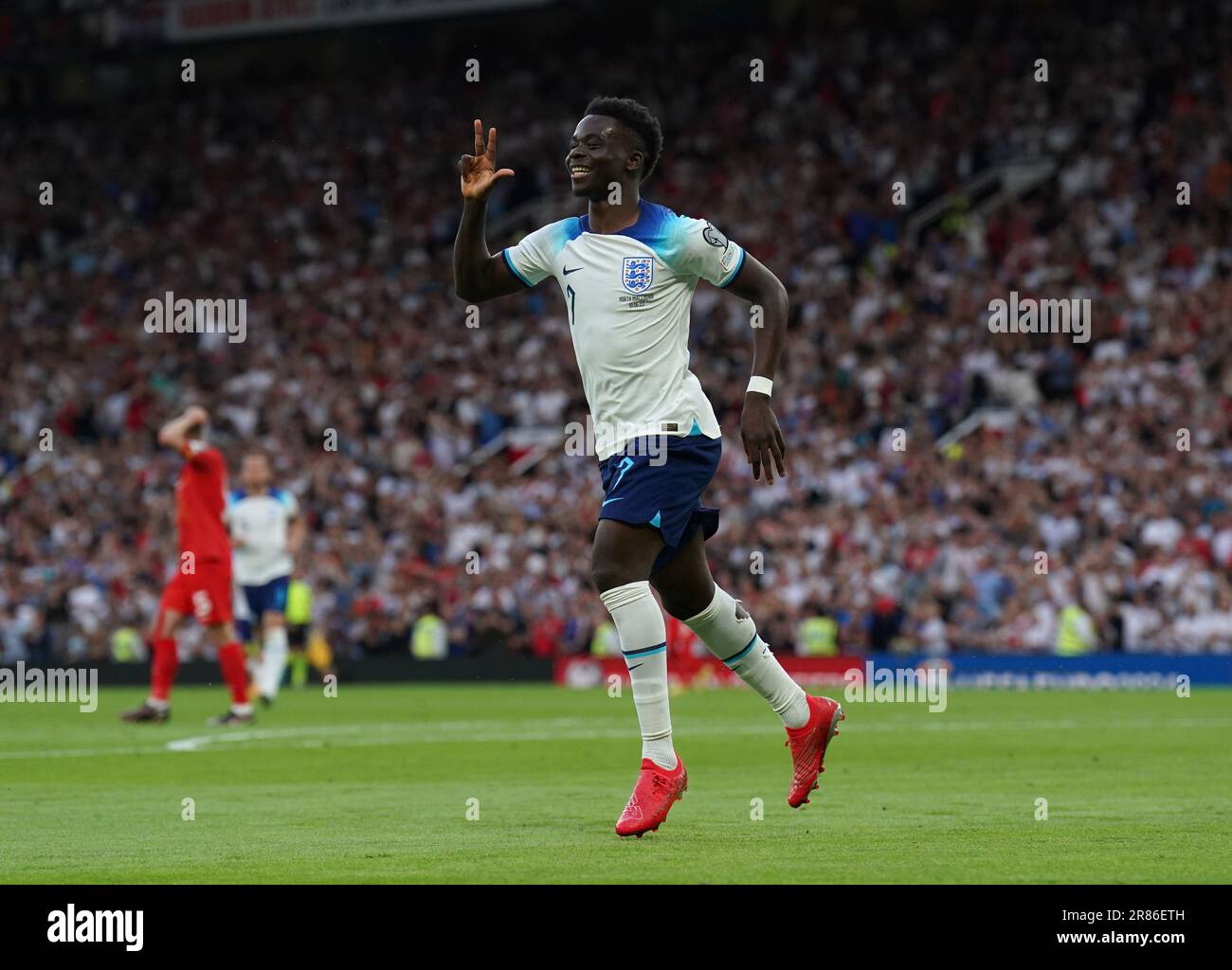 England's Bukayo Saka celebrates scoring their side's fifth goal of the ...