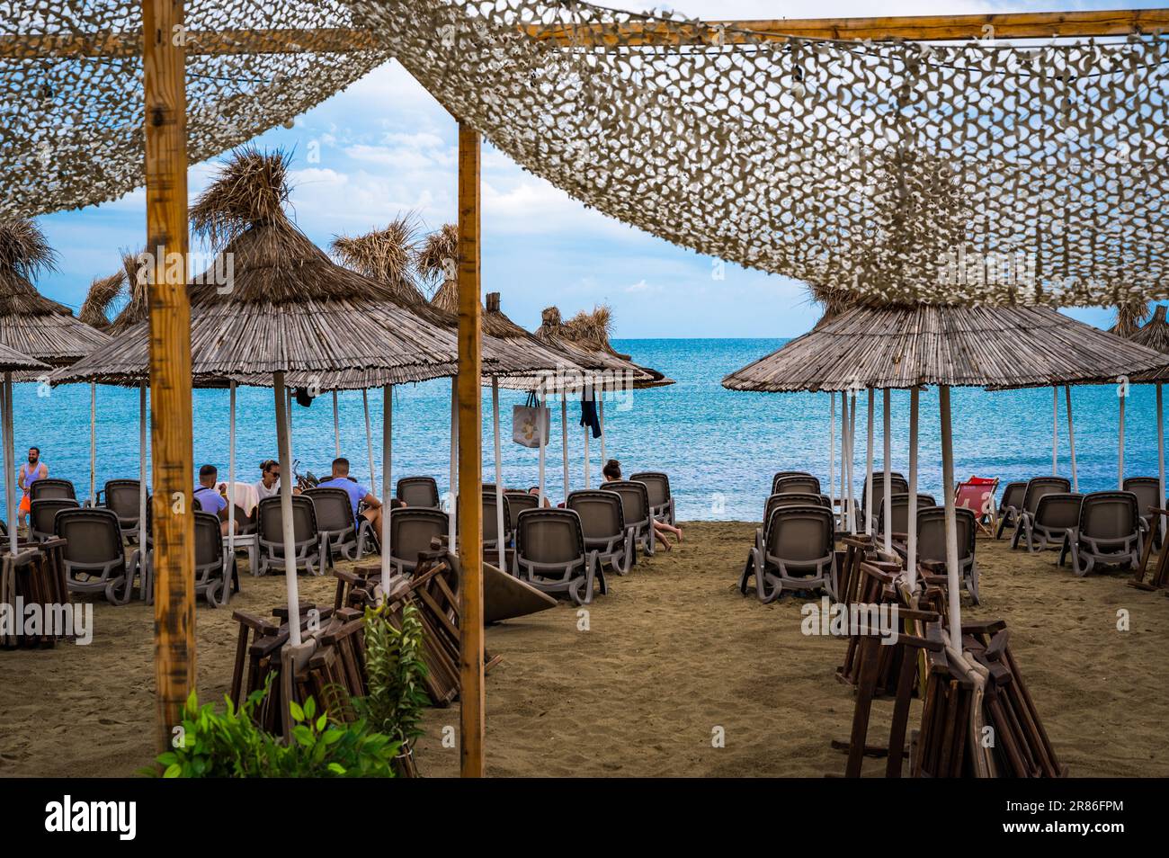 Durres, ALBANIA September 3 2022: Sunny day in Durres beach. Blue sky ...