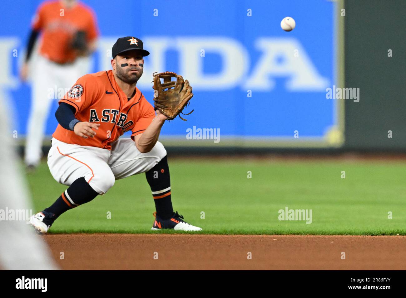 Houston Astros second baseman Jose Altuve (27) fields a line-drive in the top of the third ...