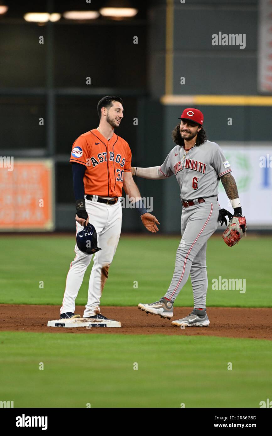 Houston Astros right fielder Kyle Tucker (30) and Cincinnati Reds second baseman Jonathan India ...