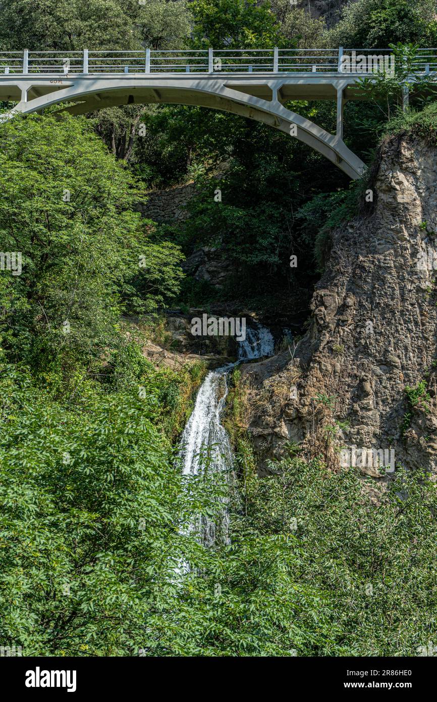 Summer landscape with bridge and waterfall in the park Stock Photo - Alamy