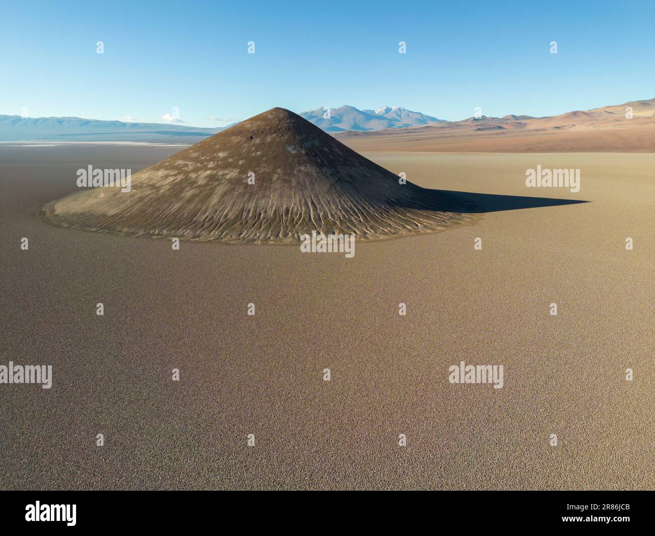 Perfectly shaped Cono de Arita in the Salar de Arizaro in the morning ...