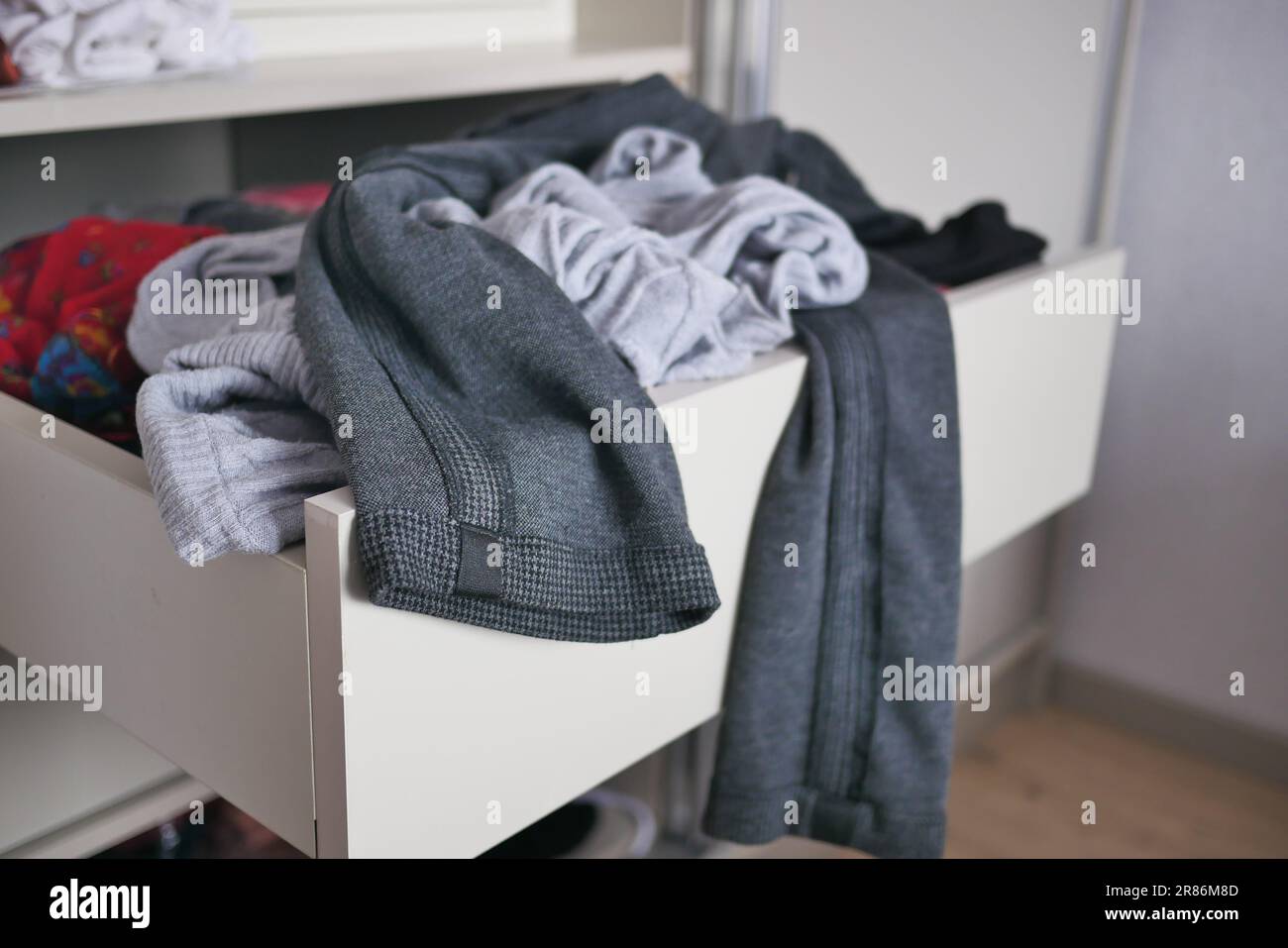 rawer with messy cloths top view Stock Photo - Alamy