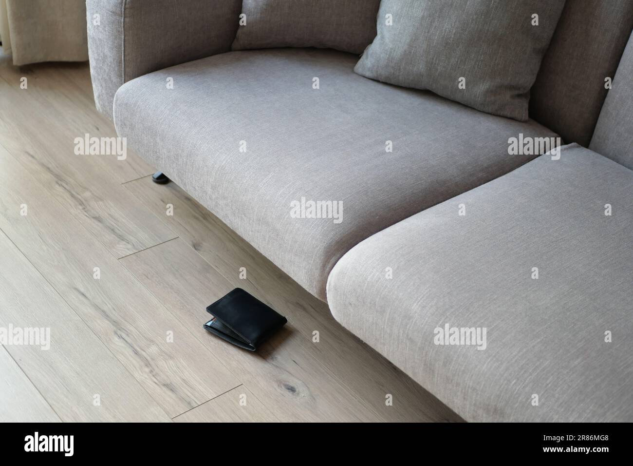 left wallet on floor at home Stock Photo - Alamy