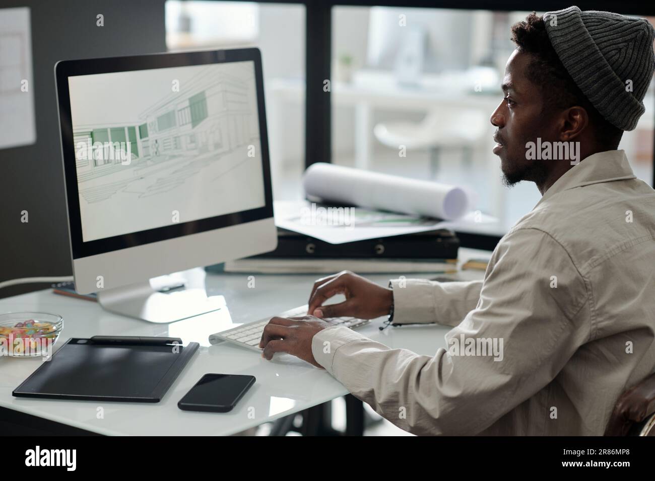 Architect looking drawings on screen hi-res stock photography and ...