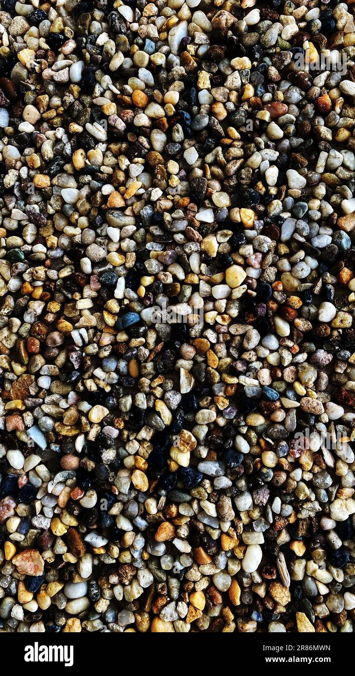 A collection of colorful pebbles creating a natural pattern Stock Photo ...