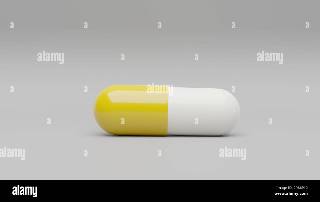 Yellow white capsule pill on a white background - Medicine healthcare ...