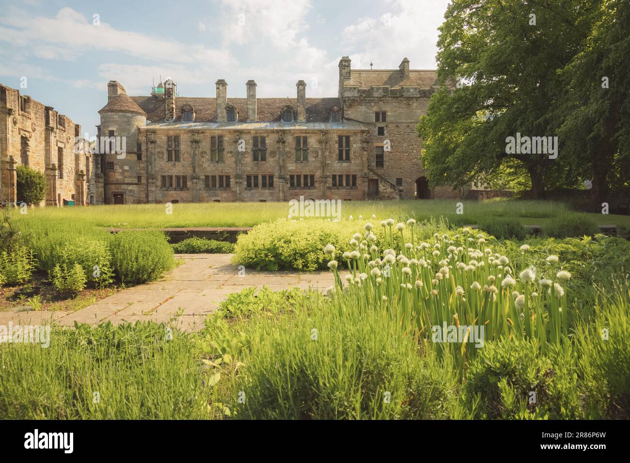 Historic Falkland Palace and with landscaped gardens on a sunny summer ...
