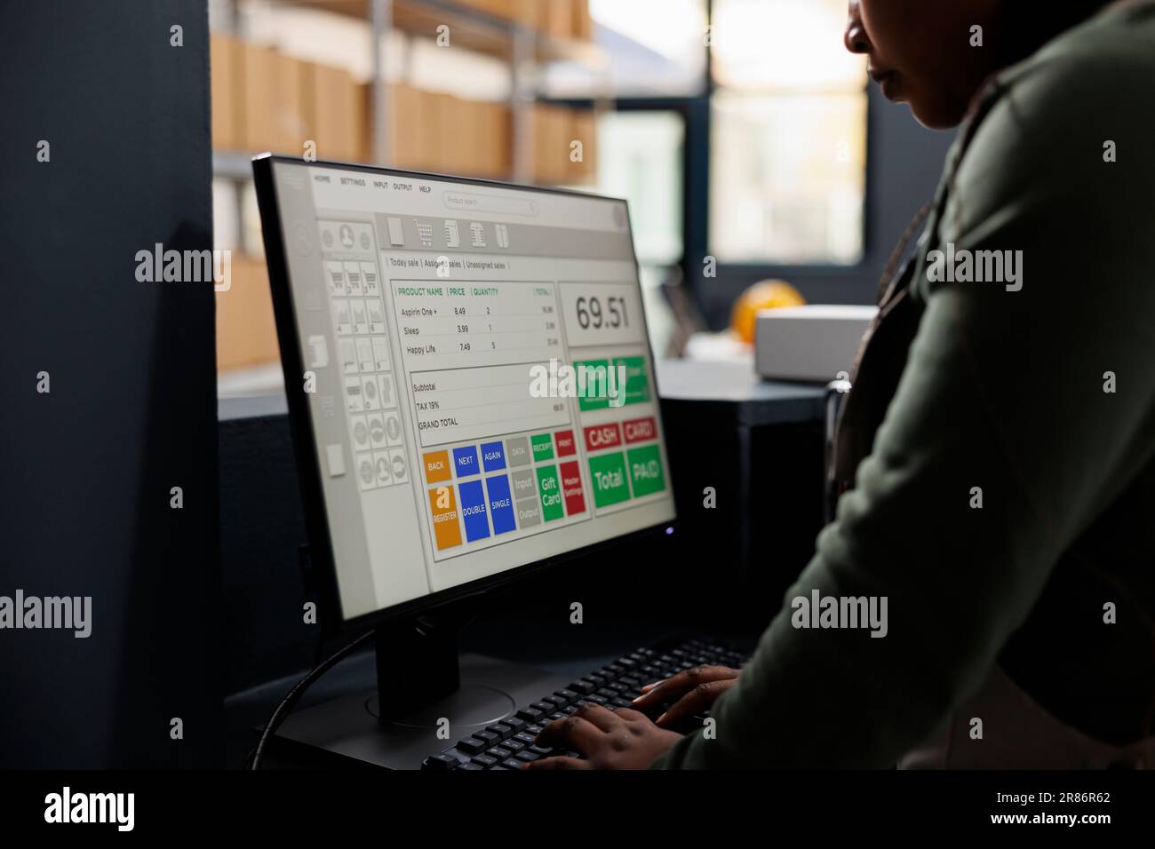 African american worker analyzing goods logistics on computer, working ...