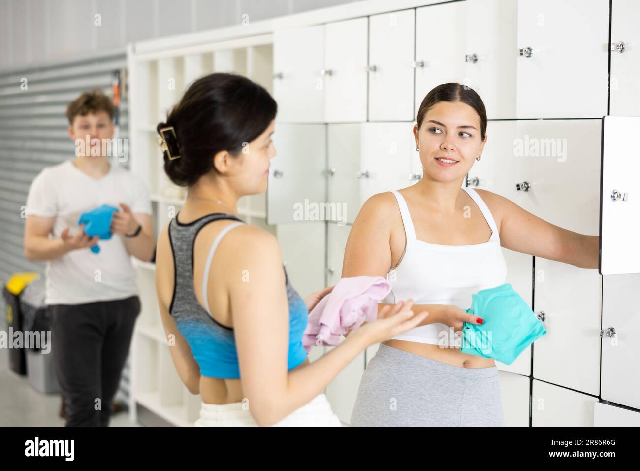 Changing clothes woman locker room hi-res stock photography and images ...