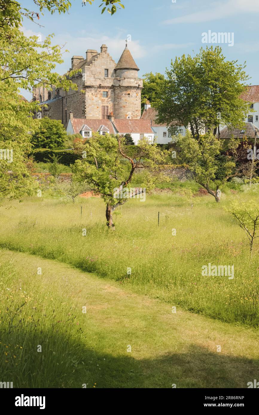 Historic Falkland Palace and village with landscaped gardens on a sunny ...