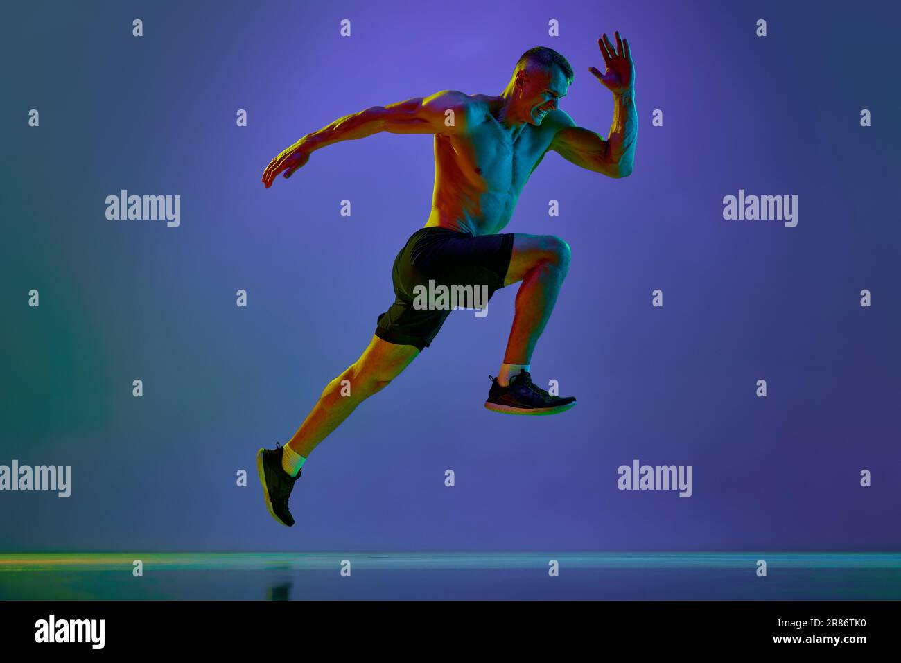 Dynamic image of young man with muscular, strong, fit body ...