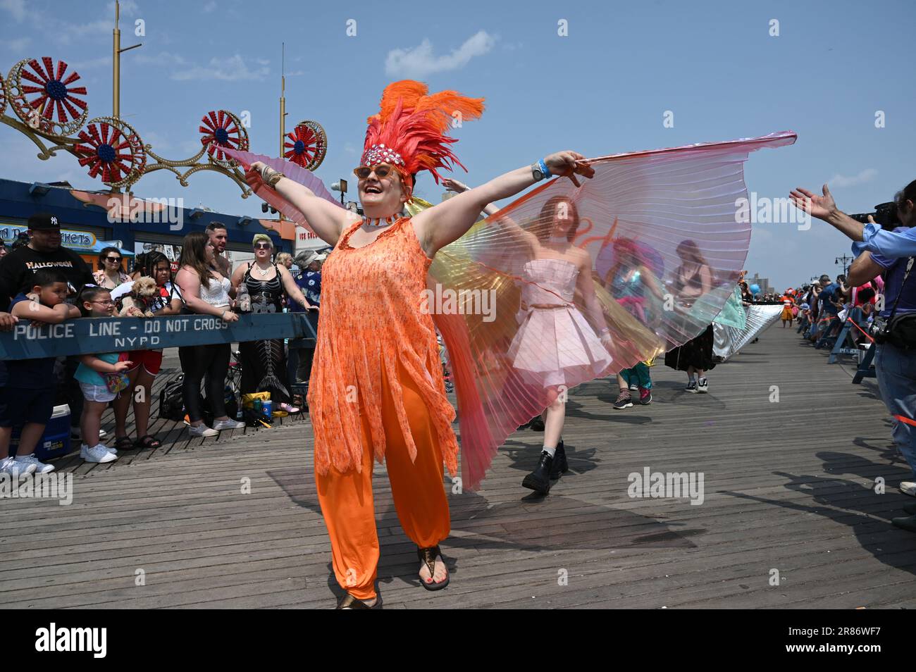 Mermaids marching on the broadwalk Stock Photo - Alamy