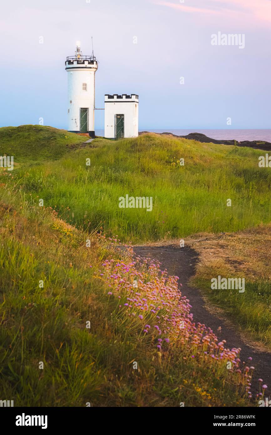 Scenic seascape landscape at dusk of Elie Ness Lighthouse on the East ...