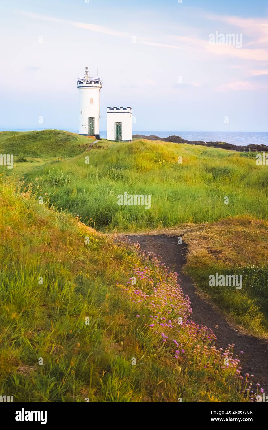 Scenic seascape landscape at sunset or sunrise of Elie Ness Lighthouse ...