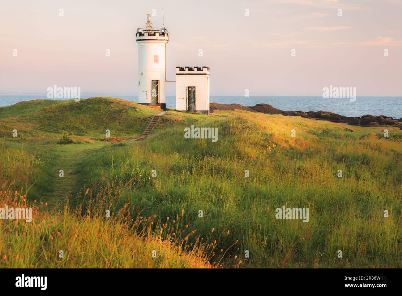 Scenic seascape landscape at sunset or sunrise of Elie Ness Lighthouse ...