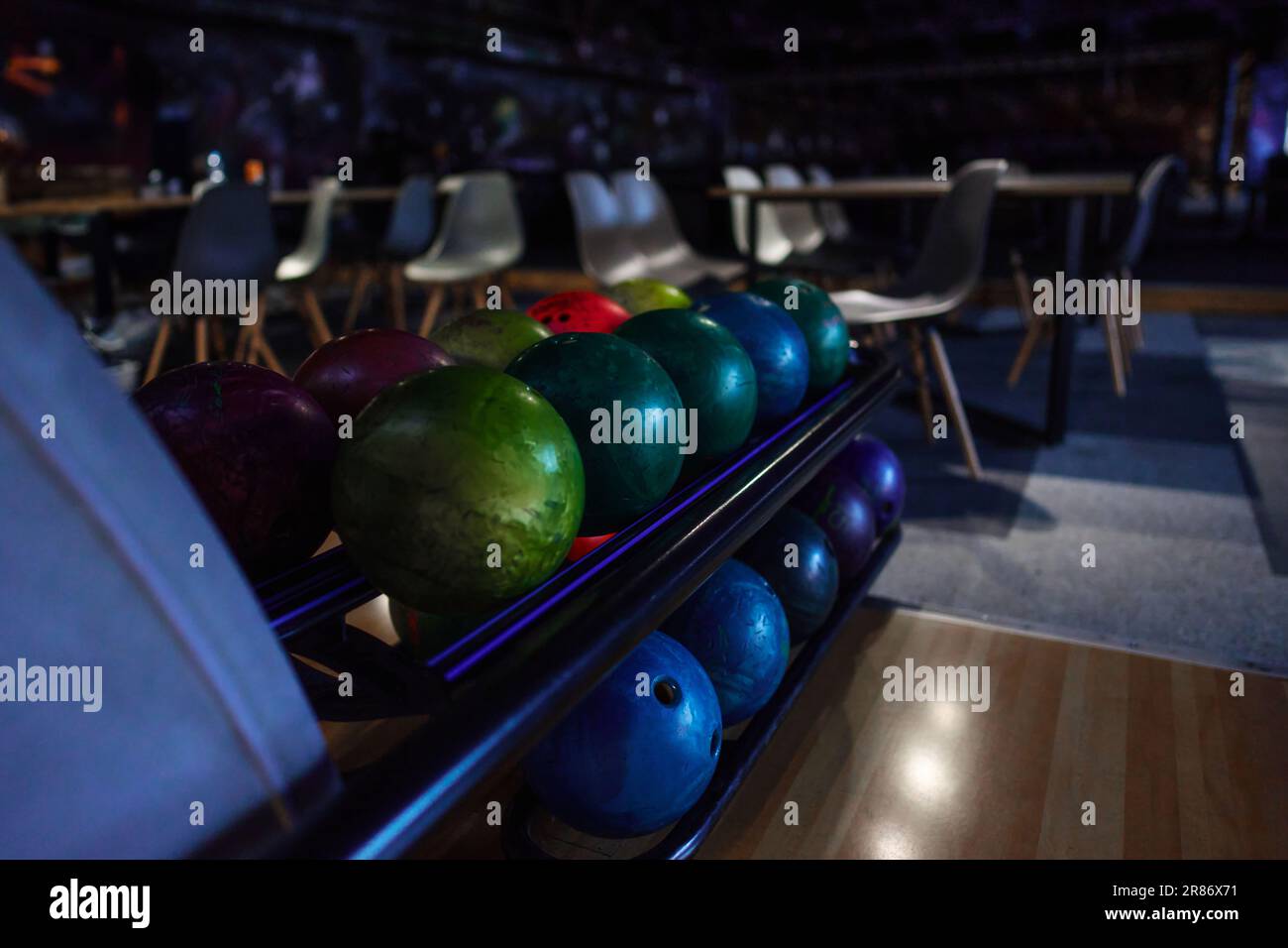 The photo showcases a collection of bowling balls, impressing with ...