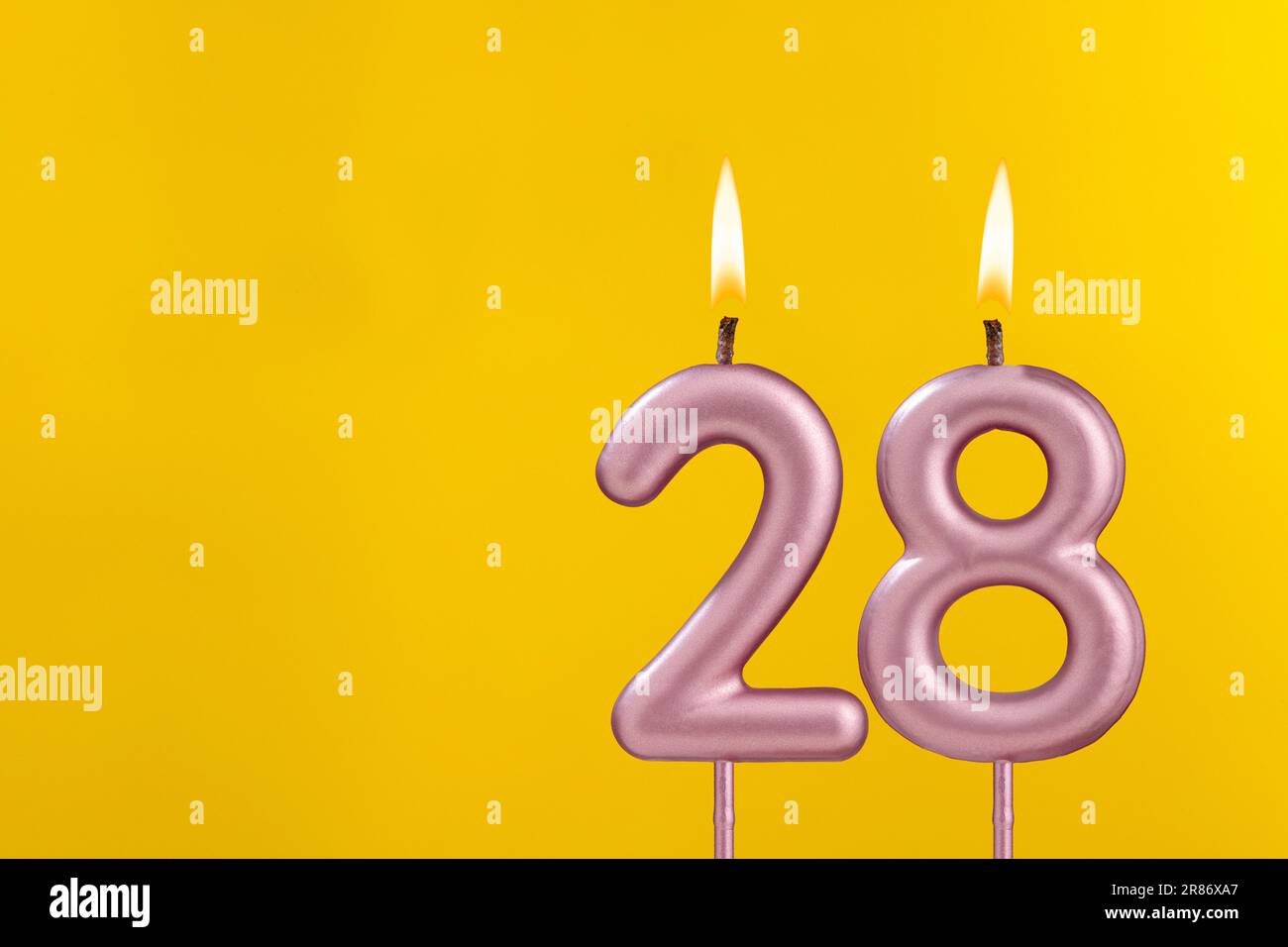 Candle 28 with flame - Birthday card on yellow luxury background Stock ...