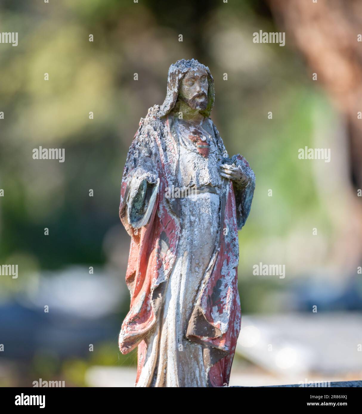 Sculptures of Catholic saints worn by time Stock Photo - Alamy