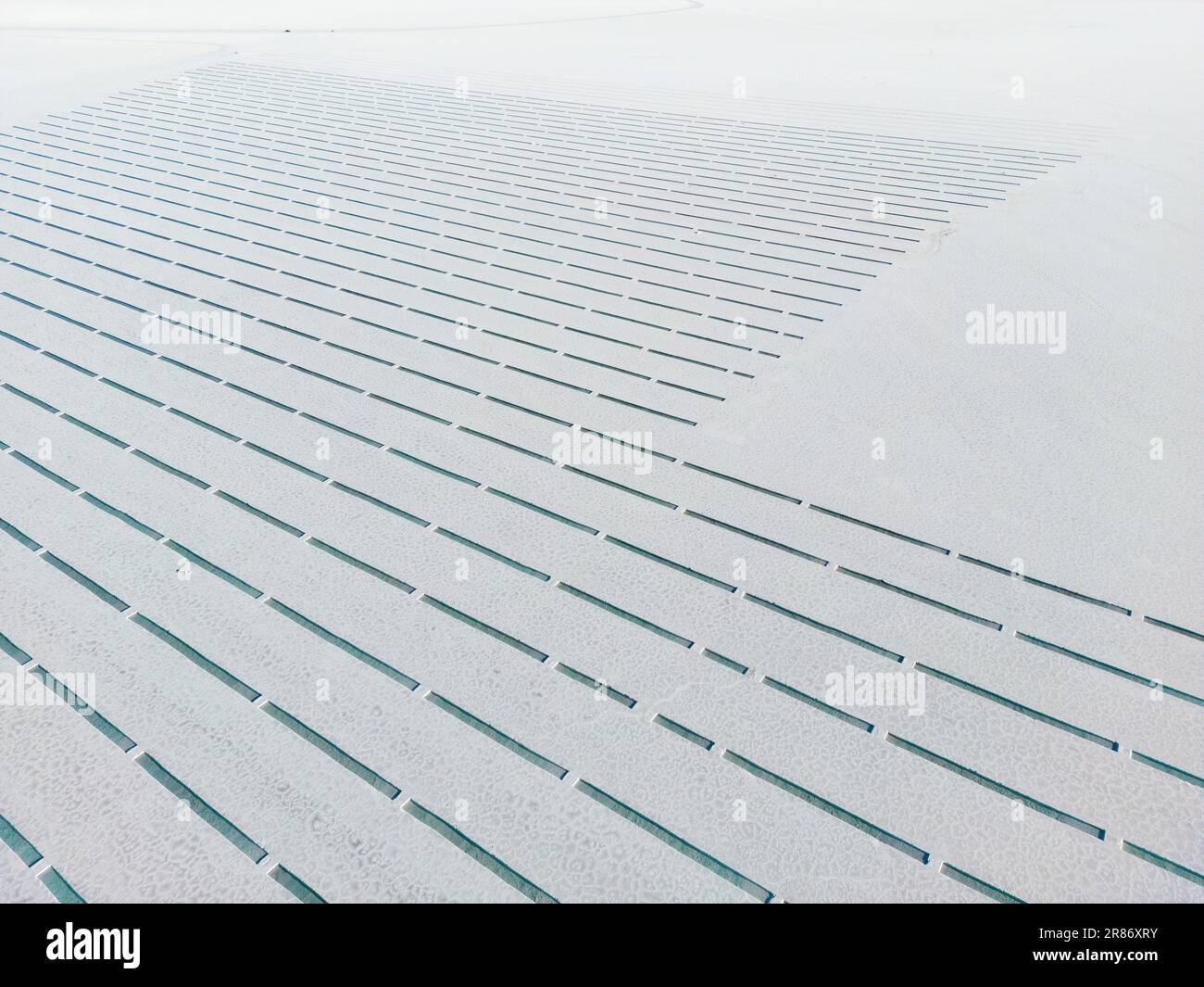 Aerial view of the salt basins in the salt crust of the huge salt flats ...