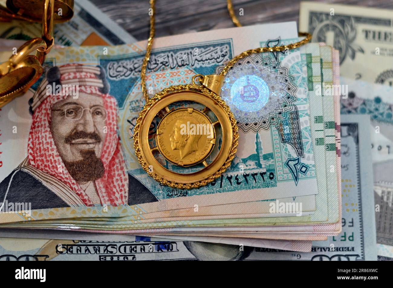 American dollars, Egyptian pounds and Saudi Arabia Riyals banknotes ...
