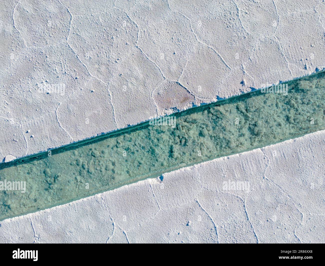 Aerial view of the salt basins in the salt crust of the huge salt flats ...
