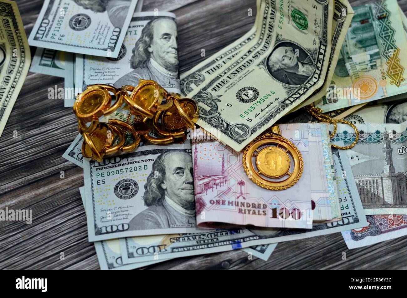 American dollars, Egyptian pounds and Saudi Arabia Riyals banknotes ...