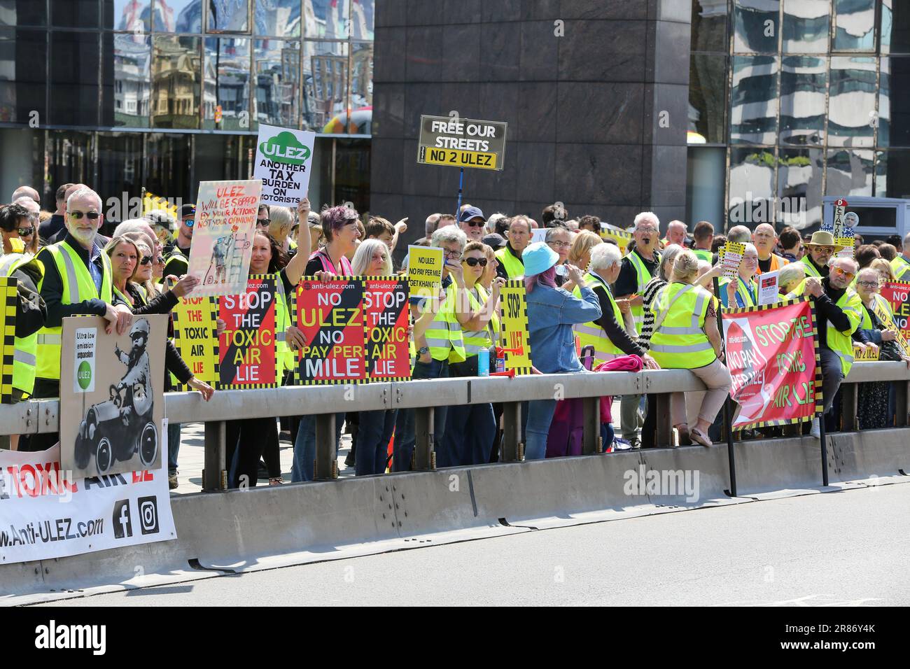 Anti ULEZ campaigners hold signs expressing their opinions on London ...