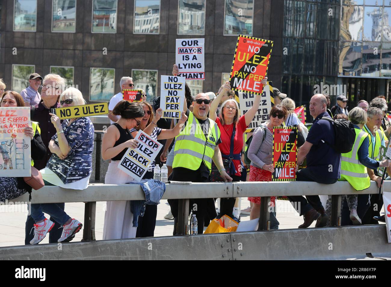 Anti ULEZ campaigners hold signs expressing their opinions on London ...