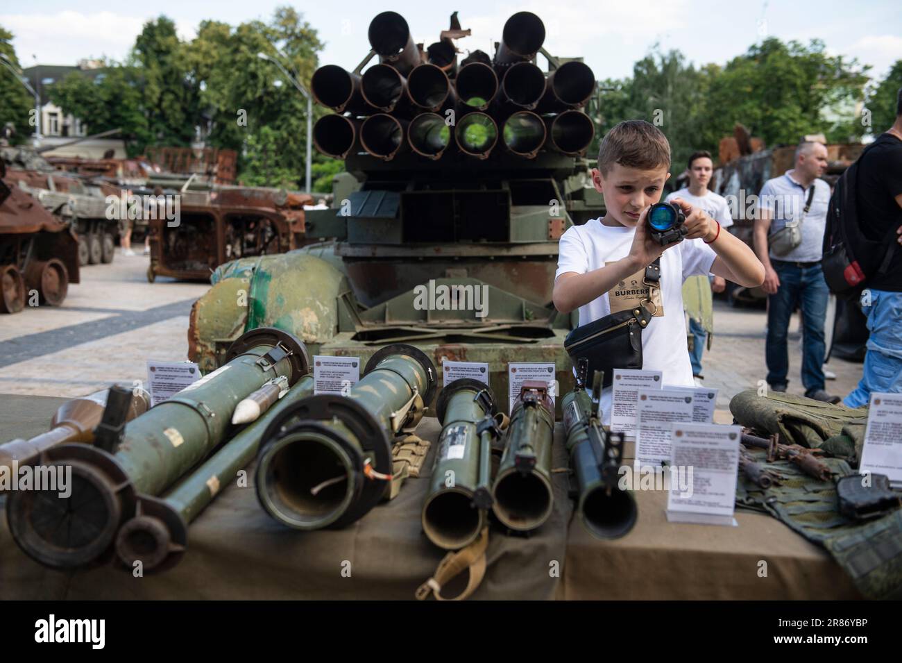 Kyiv, Ukraine. 18th June, 2023. A child examines a night vision scope ...