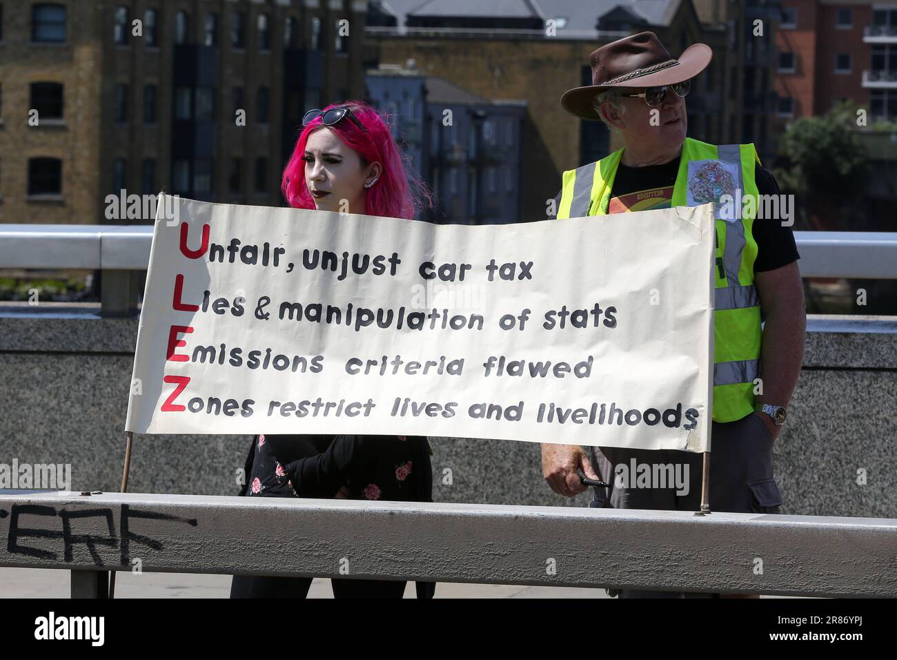 London, UK. 27th May, 2023. An anti ULEZ sign seen on London Bridge ...