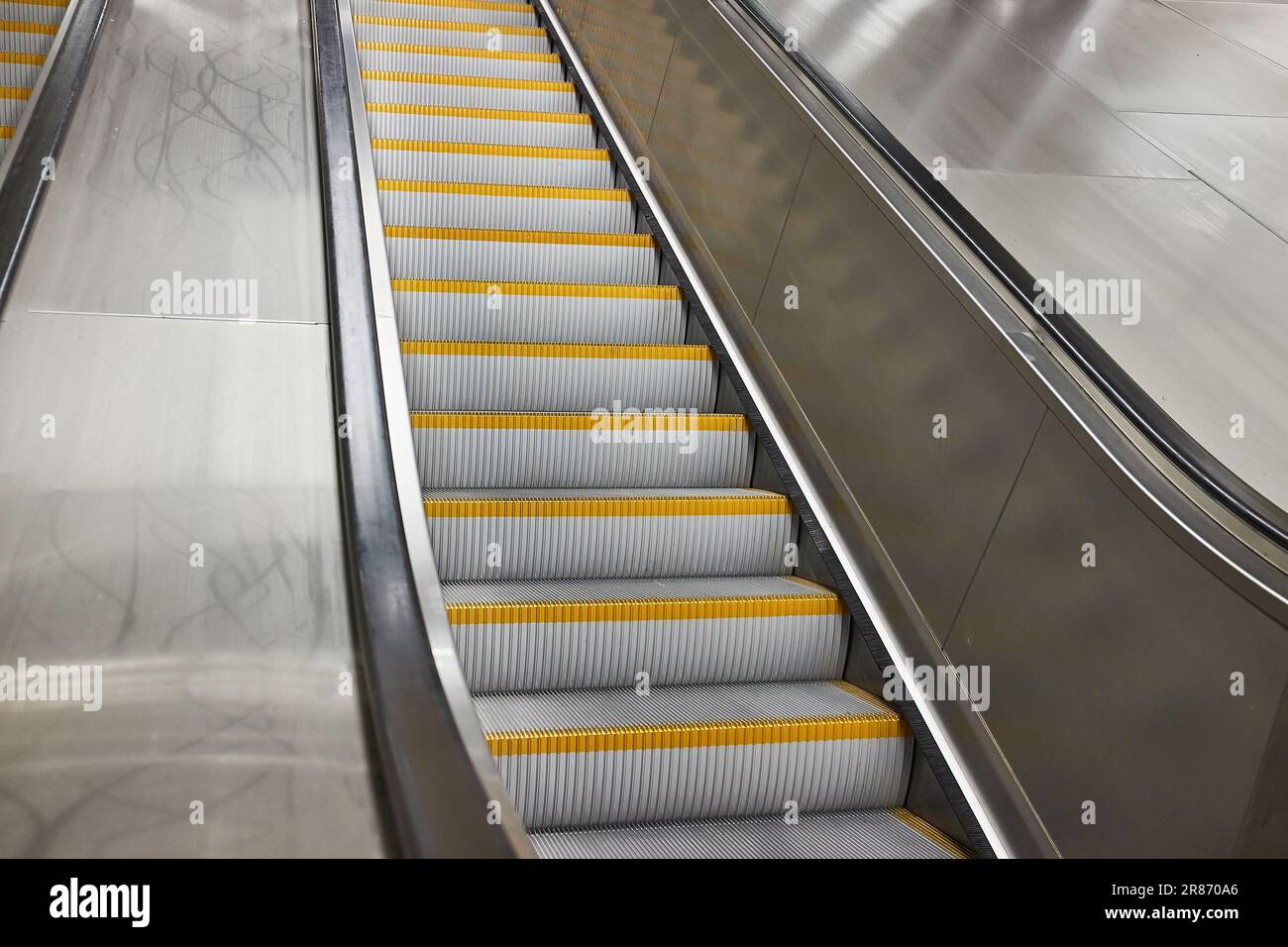 Escalator of a metro station Stock Photo - Alamy