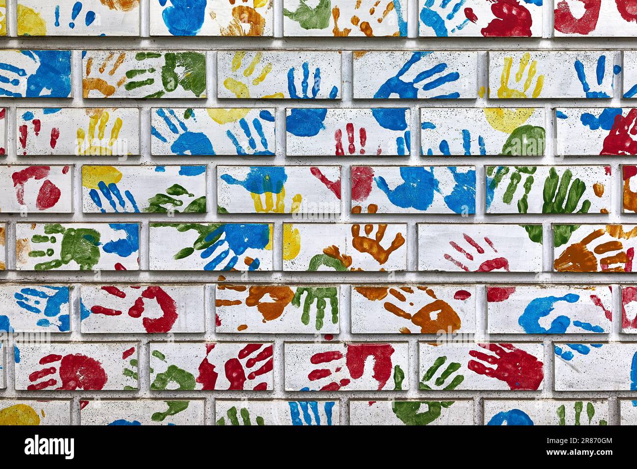 Hand shapes marked on a wall with paint Stock Photo - Alamy