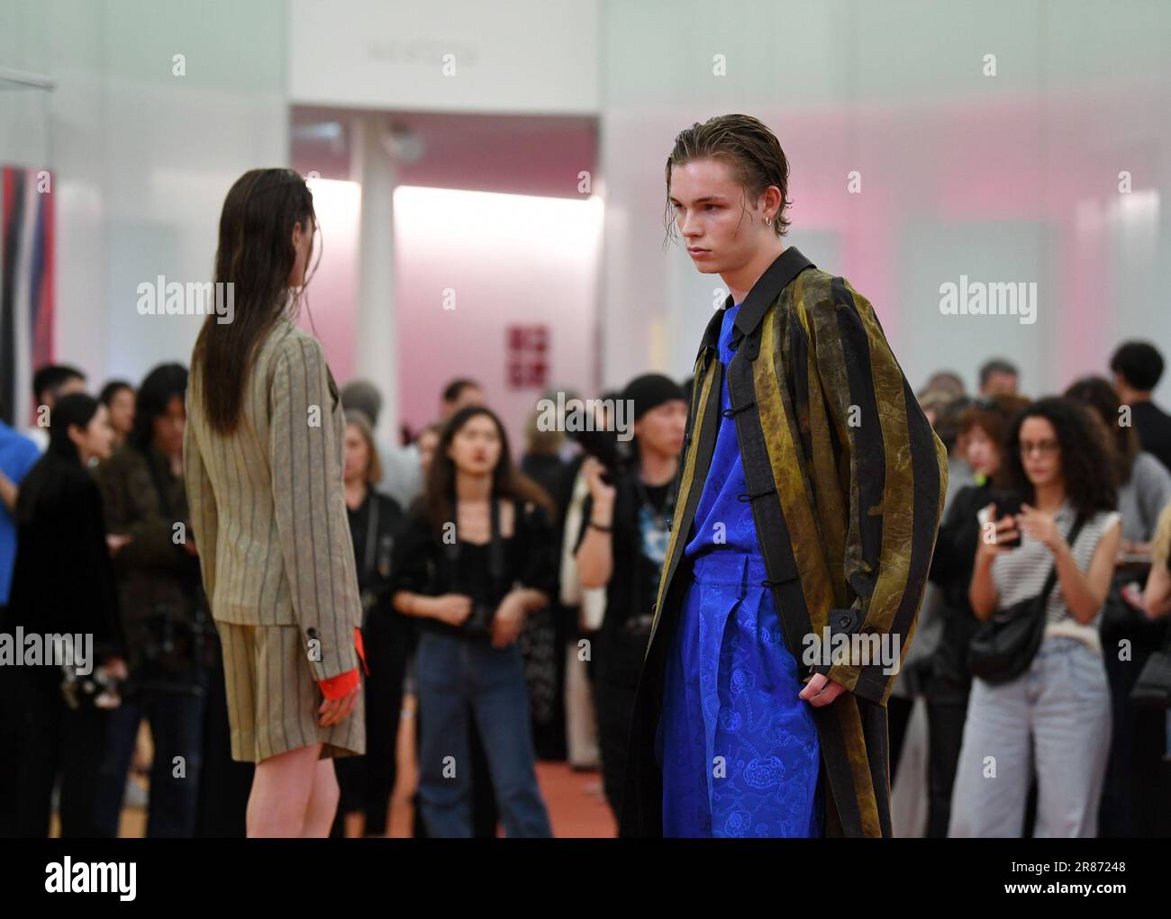 Milan, Italy. 19th June, 2023. Models present creations of SHANGHAI ...