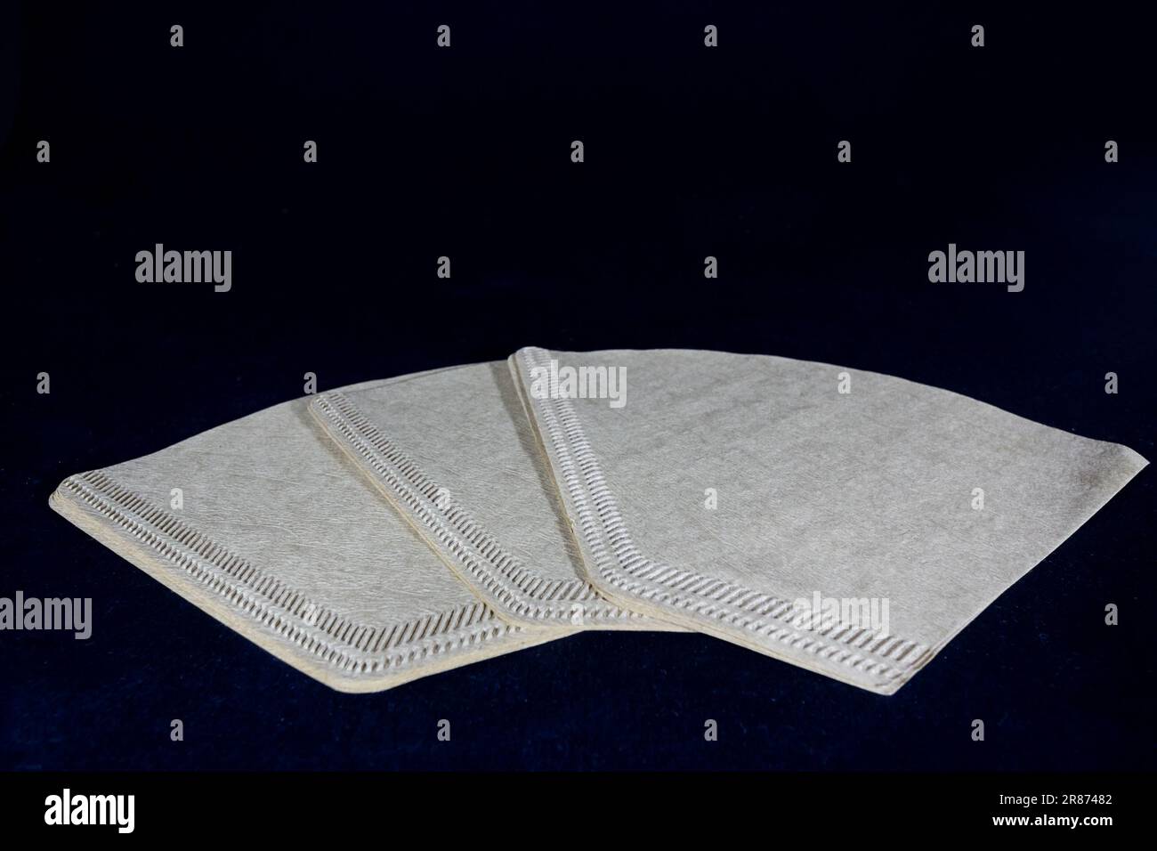 Picture of coffee filters, made of paper, on a studio shot, isolated on ...