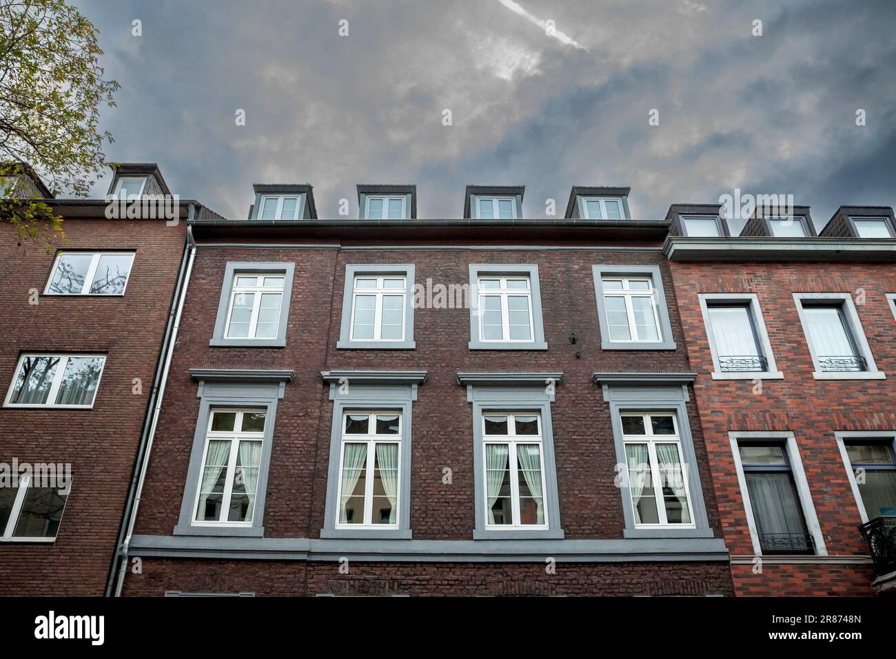 Picture of facades of residential building, with a vintage german ...