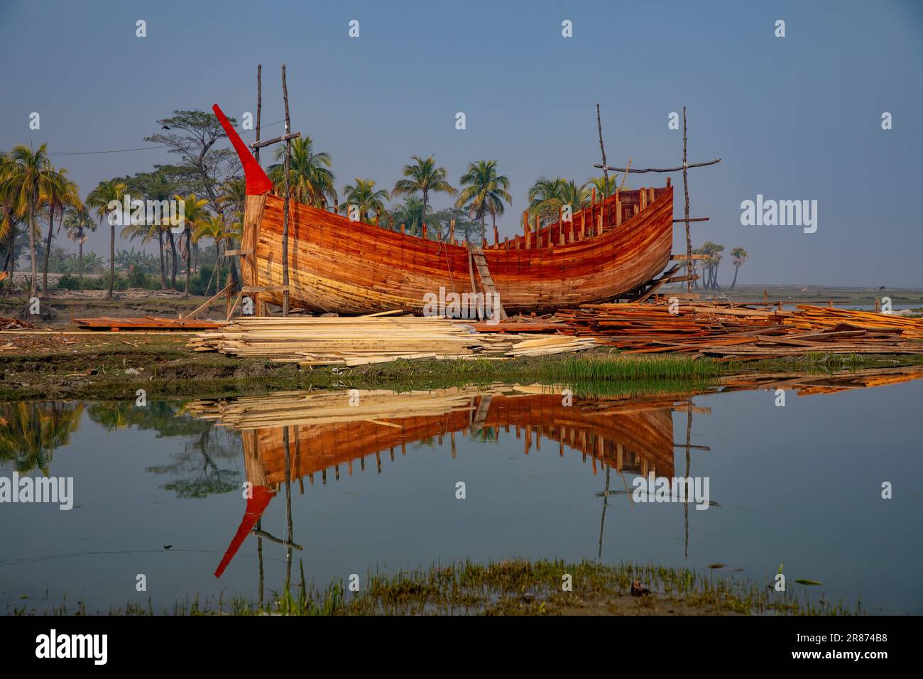Fishing boats making at Char Fasson in Bhola. Bangladesh Stock Photo ...