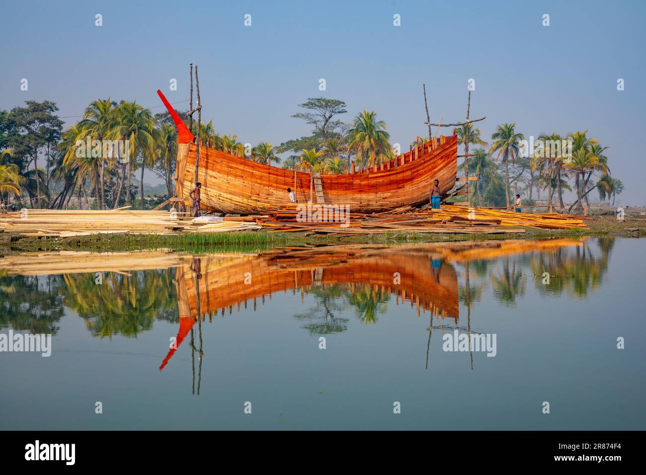 Fishing boats making at Char Fasson in Bhola. Bangladesh Stock Photo ...