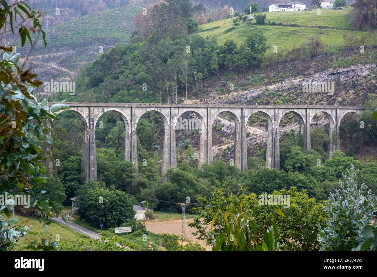 Railway bridge over the Esva river in Asturias, Spain Stock Photo - Alamy