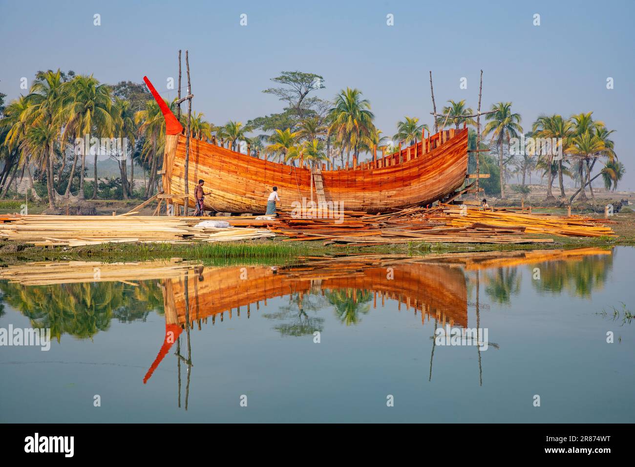 Fishing boats making at Char Fasson in Bhola. Bangladesh Stock Photo ...