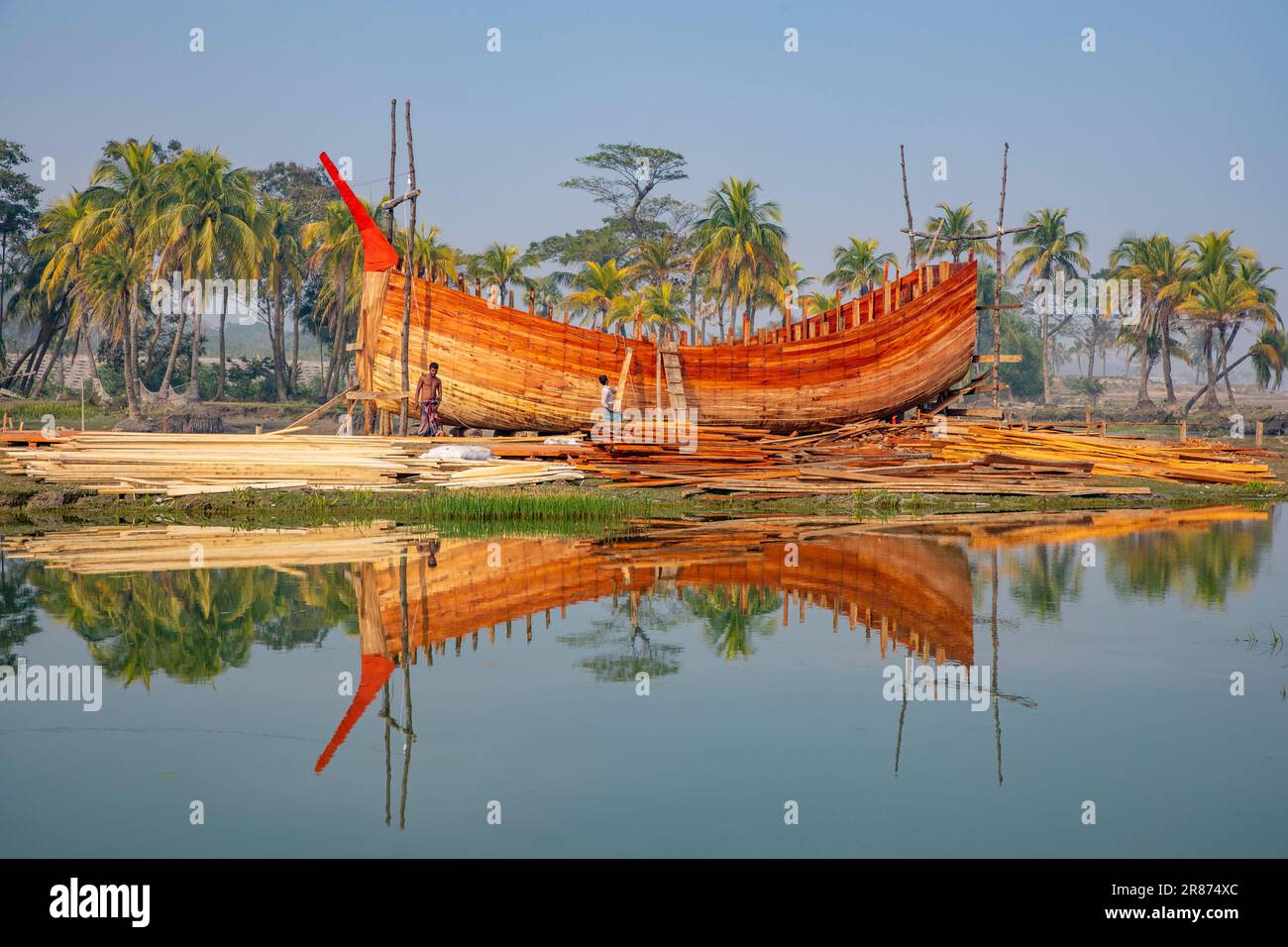 Fishing boats making at Char Fasson in Bhola. Bangladesh Stock Photo ...