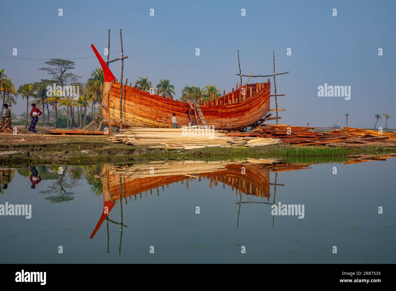 Fishing boats making at Char Fasson in Bhola. Bangladesh Stock Photo ...
