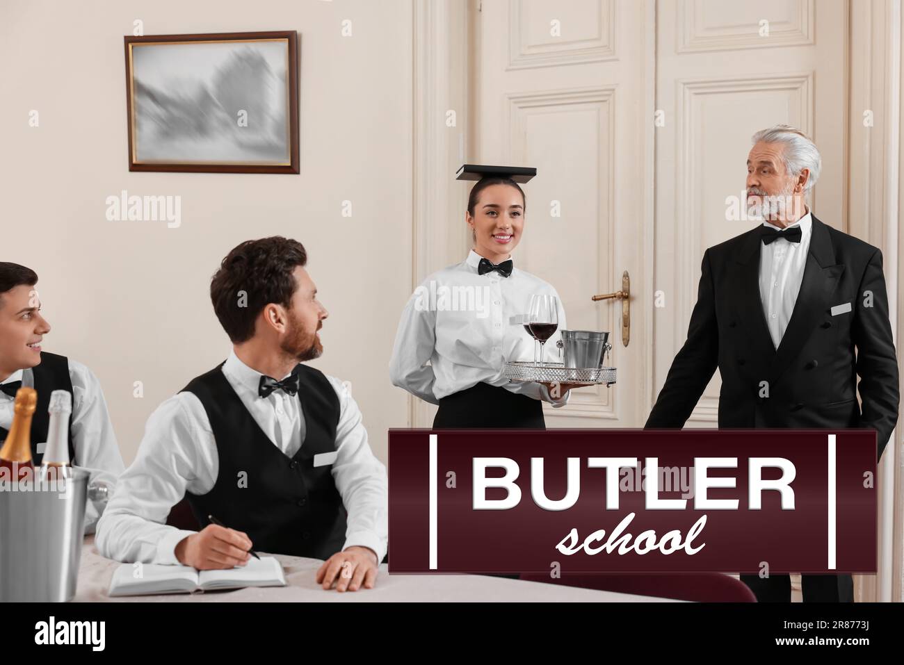 Butler school. Senior man teaching trainees indoors Stock Photo - Alamy