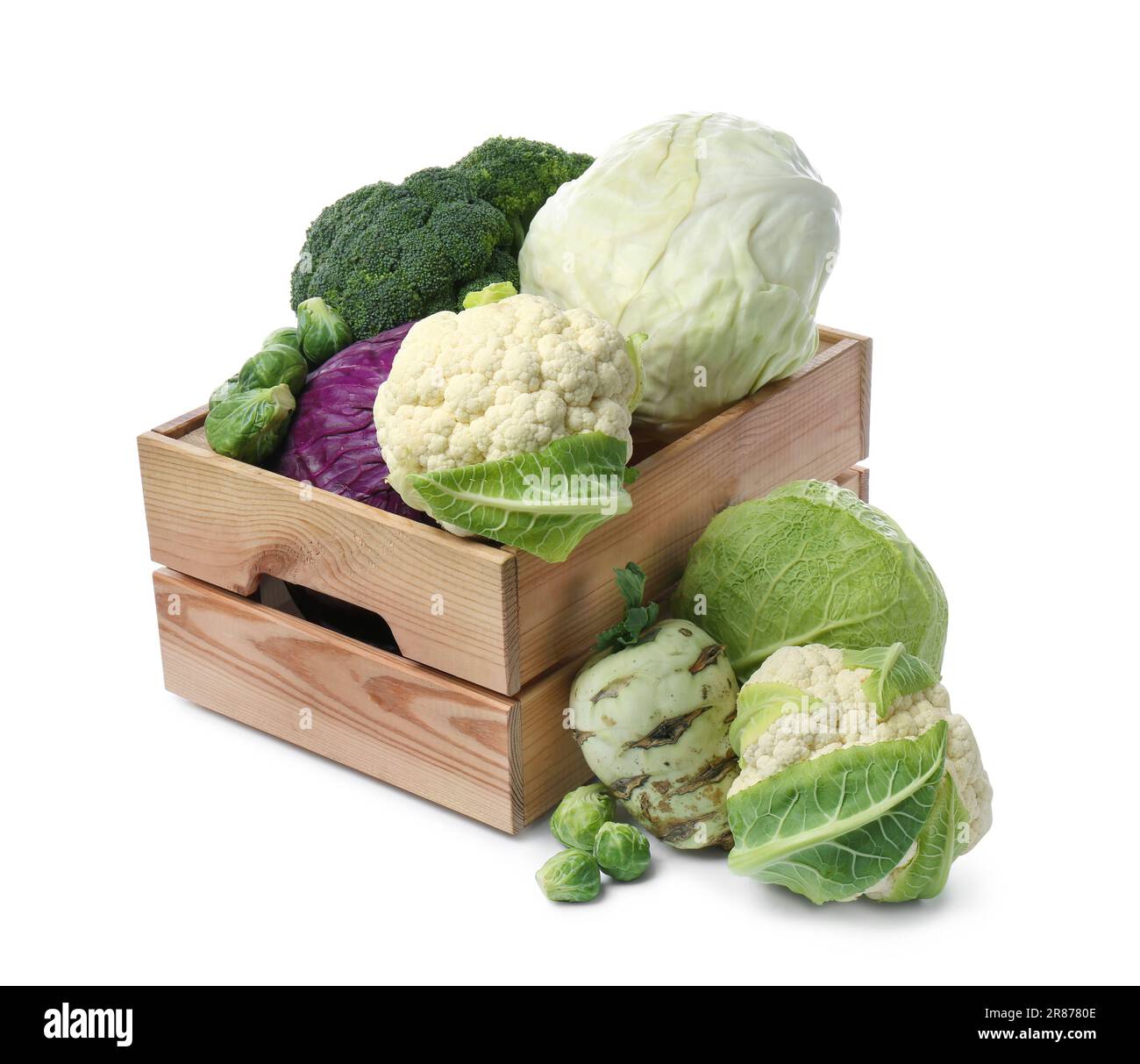 Wooden crate with different types of fresh cabbage on white background ...