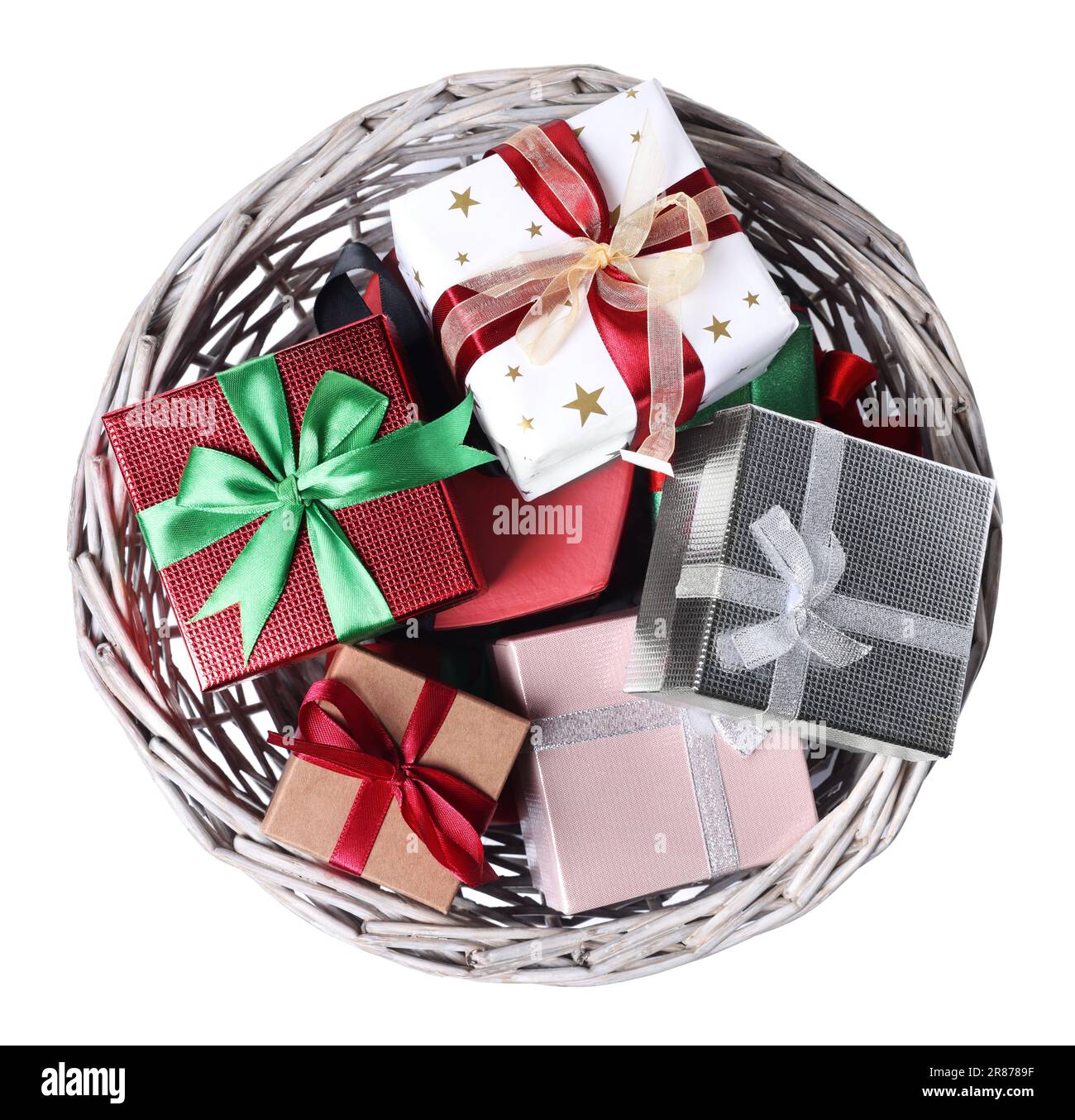 Wicker basket full of gift boxes on white background, top view Stock ...